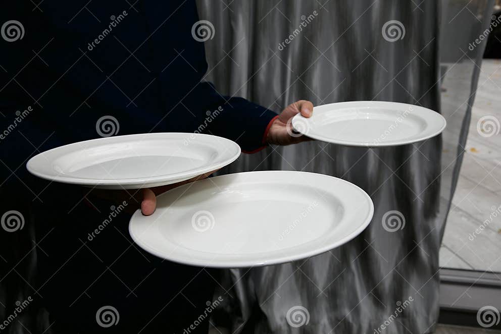 Waiter Carrying Three Plates Stock Photo - Image of industry, work ...
