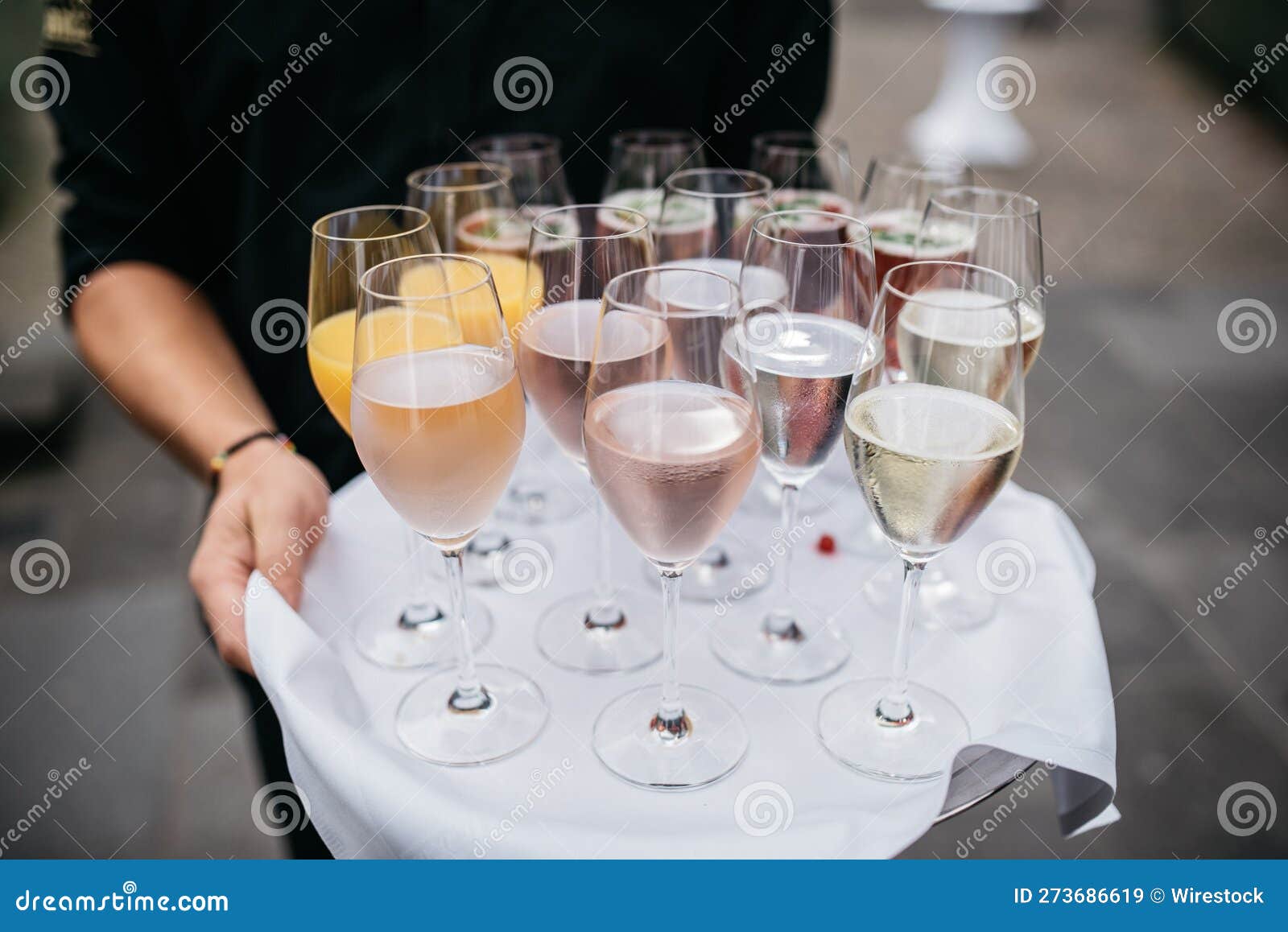 Waiter Carrying a Tray Full of an Assortment of Drinks Stock Image ...