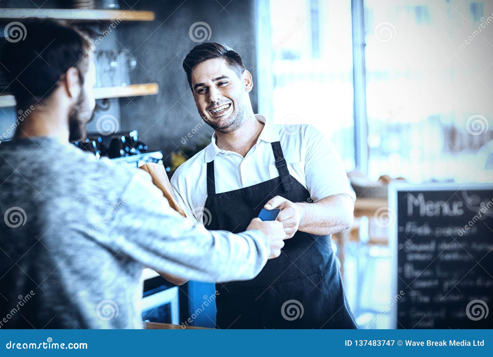 Waiter Giving Bread To Customer at Counter Stock Image - Image of ...