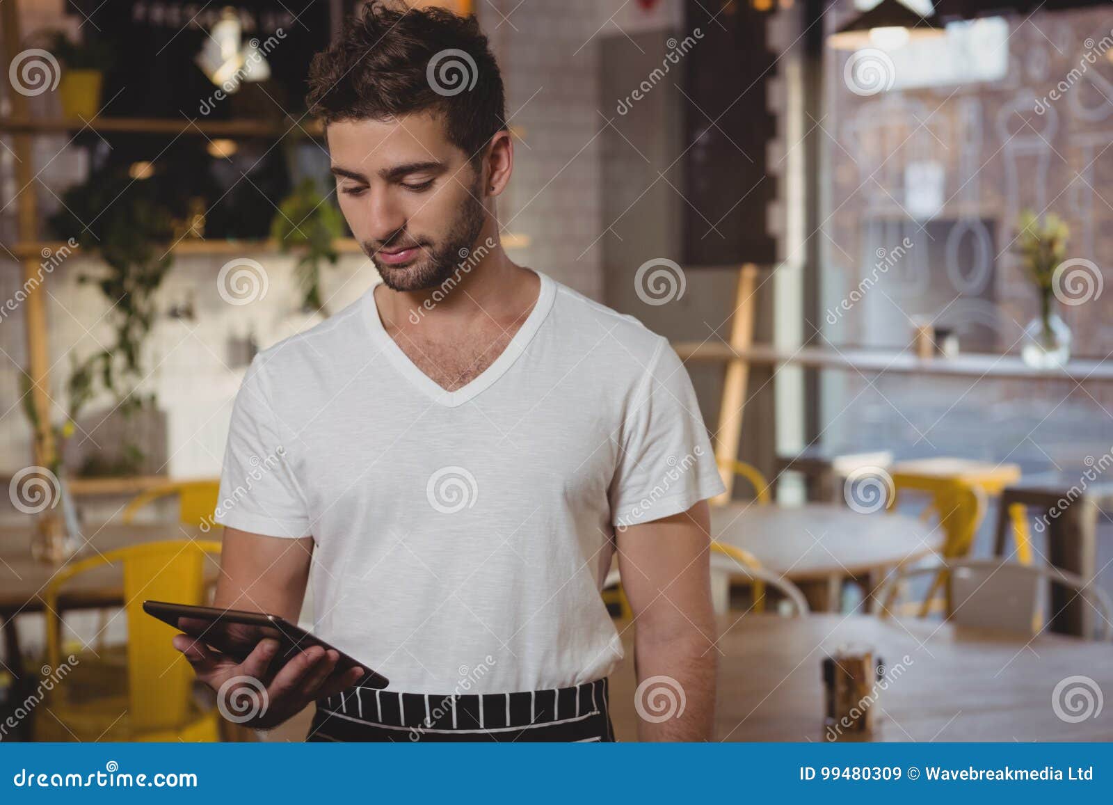 Waiter Holding Digital Tablet in Cafe Stock Image - Image of chair ...