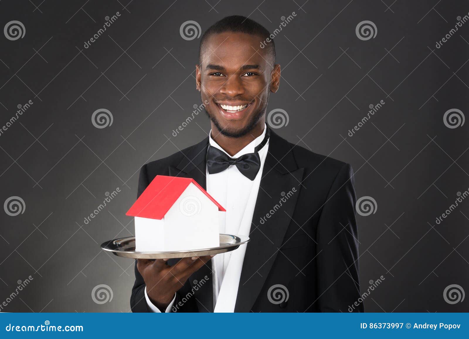 Waiter Holding House Model in Tray Stock Image - Image of hospitality ...