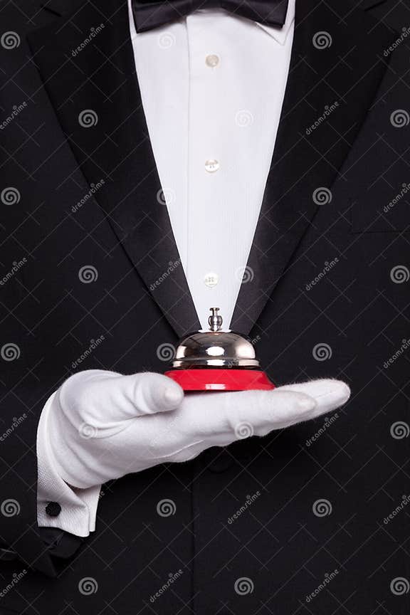 Waiter Holding a Service Bell. Stock Photo - Image of holding, people ...