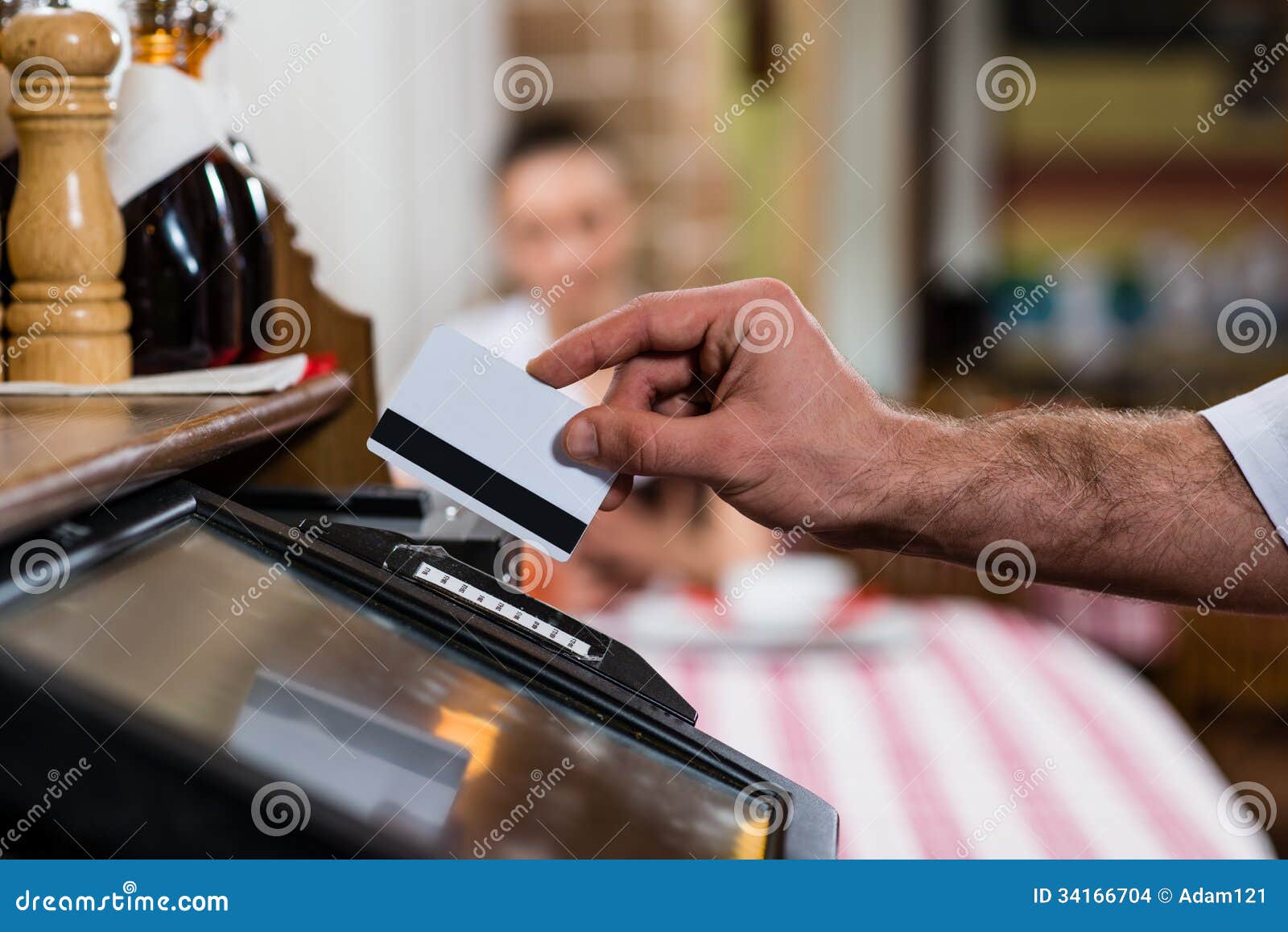 Waiter Inserts the Card into a Computer Terminal Stock Photo - Image of ...