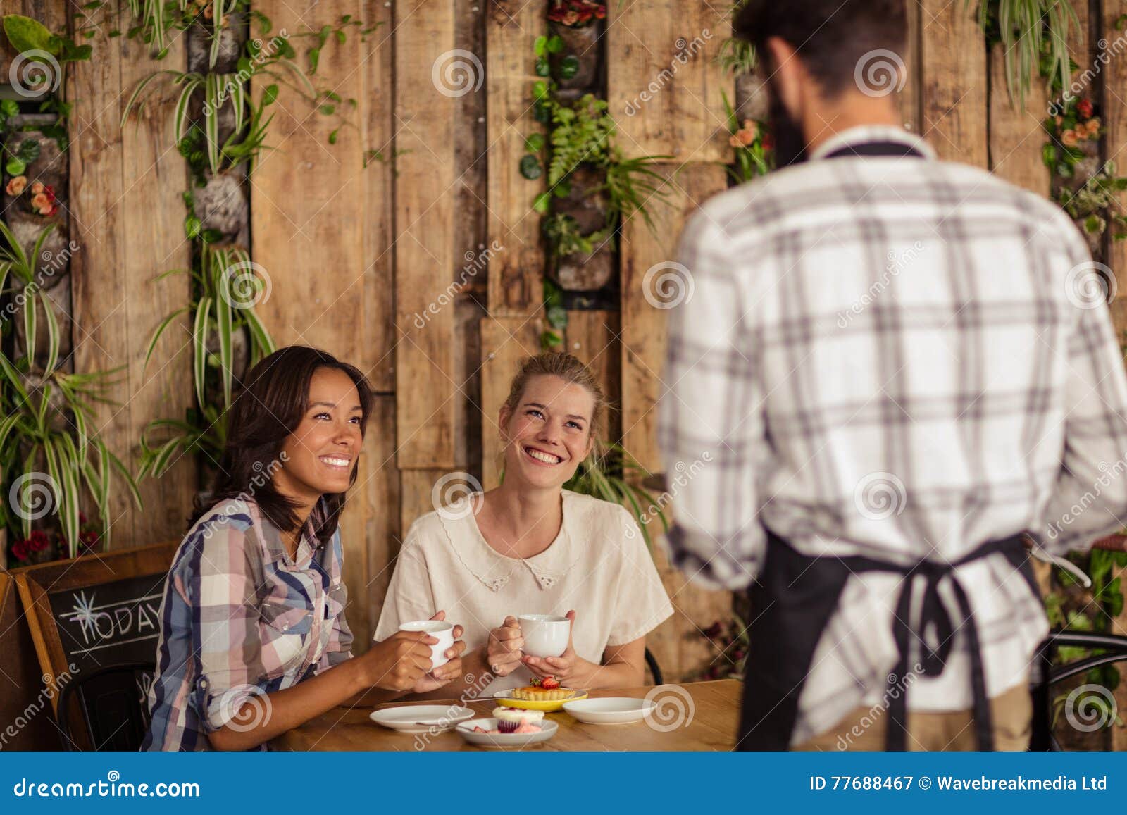 Waiter Interacting with Customers Stock Image - Image of drink ...