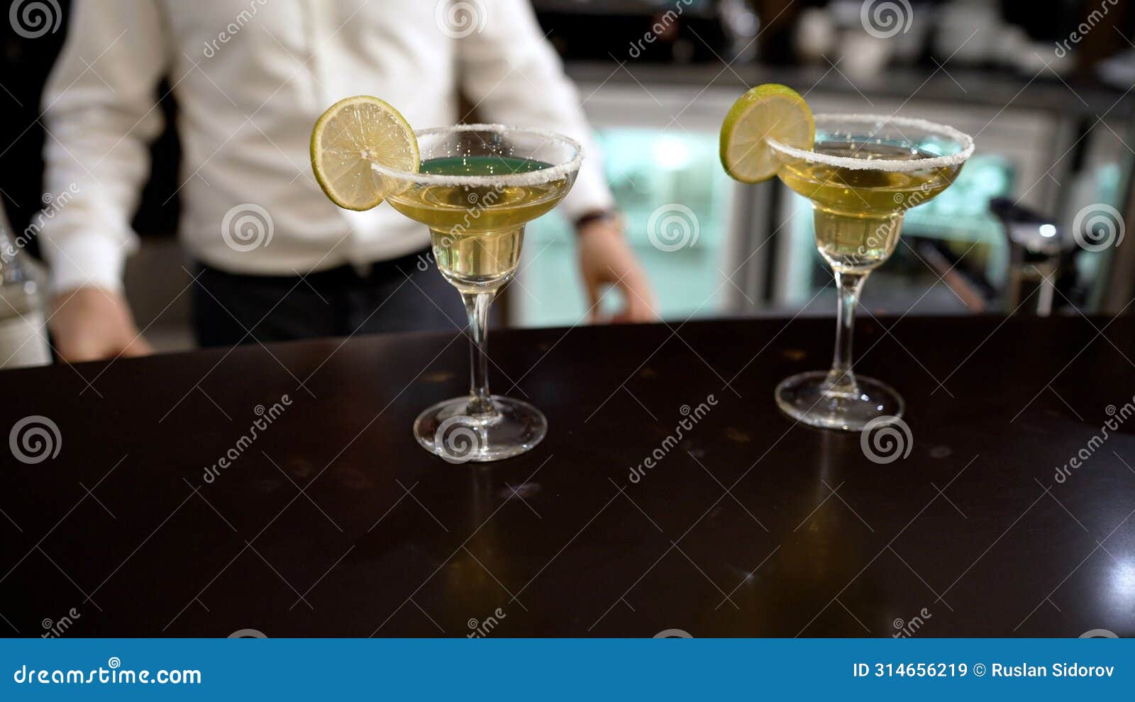 Bar Counter And Two Martini Glasses Waiter And Martini Glasses Stock