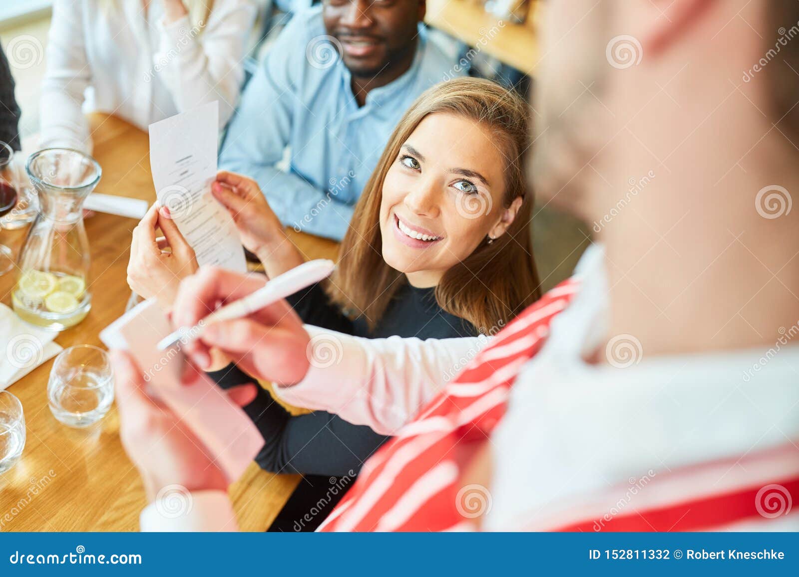 Waiter with Notepad Takes Order Stock Photo - Image of people, food ...