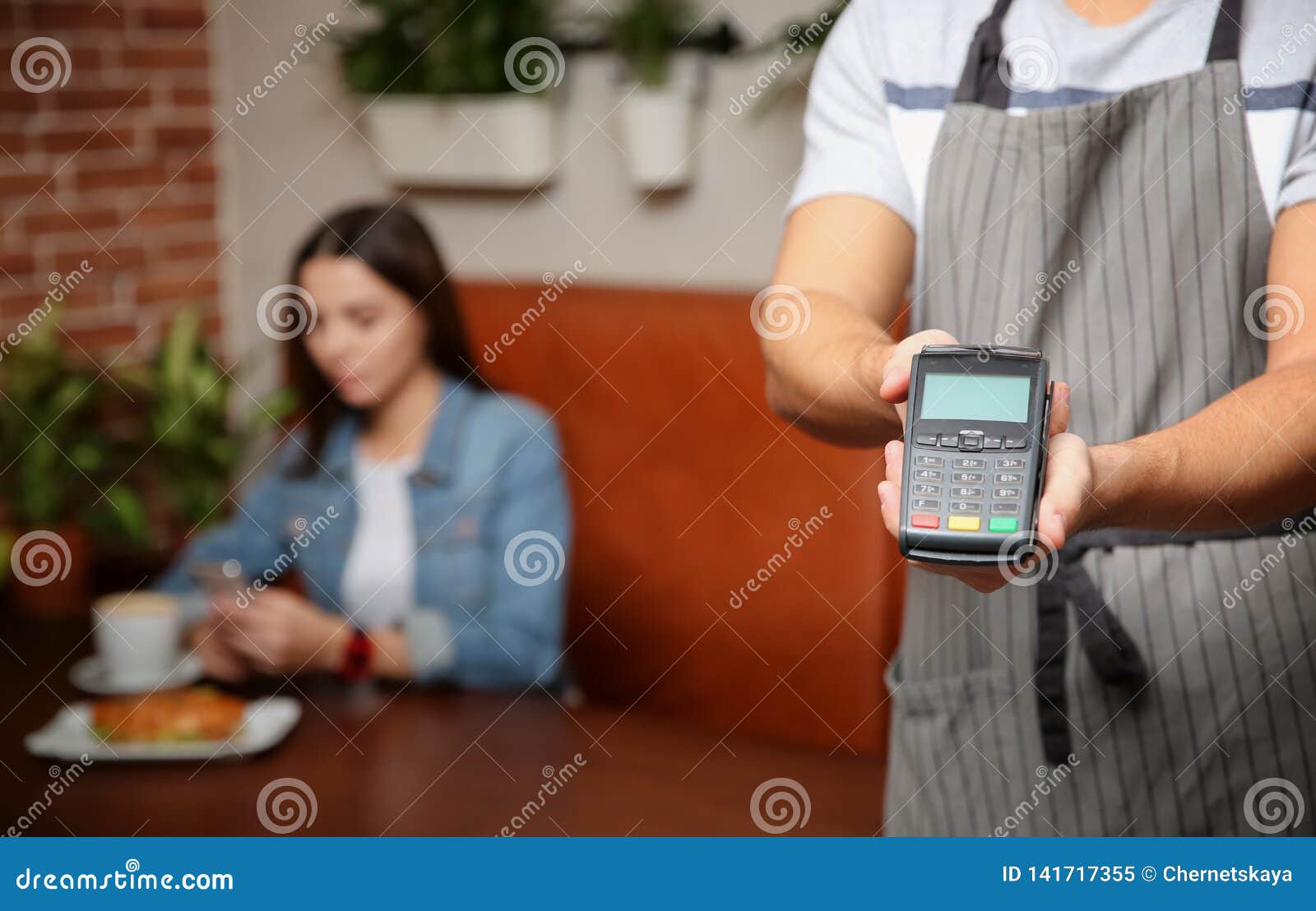 Waiter with Payment Terminal in Cafe, Closeup. Stock Image - Image of ...