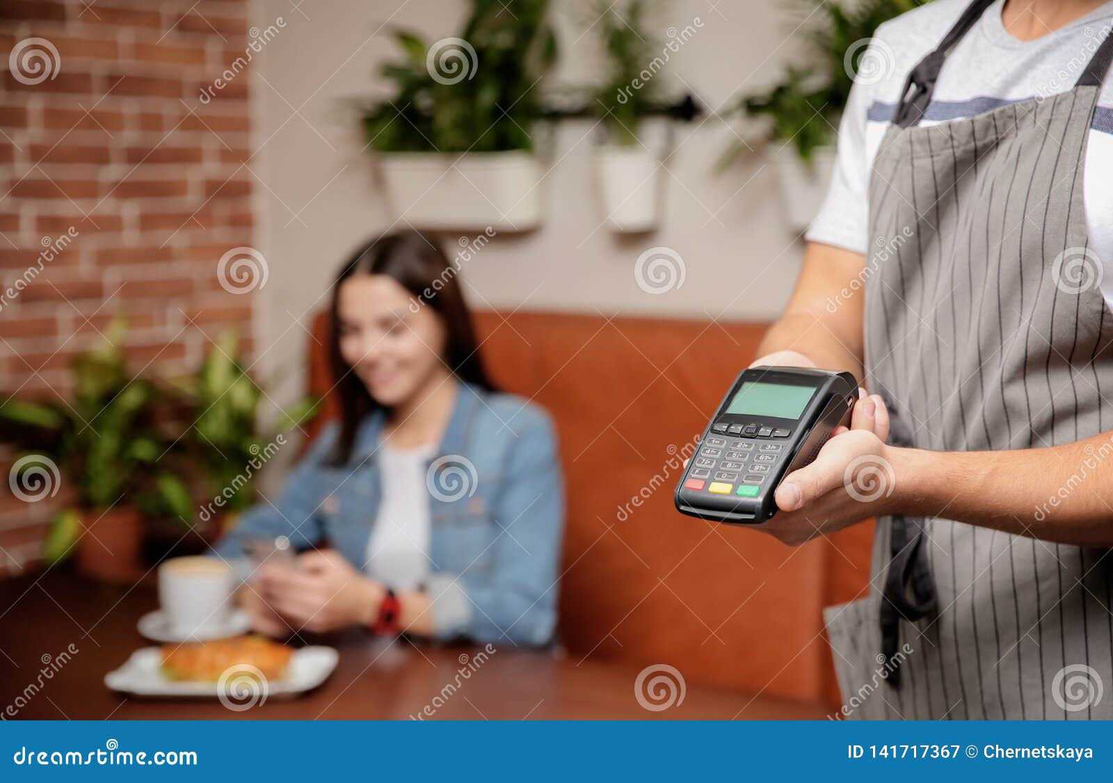 Waiter with Payment Terminal in Cafe, Closeup. Stock Image - Image of ...