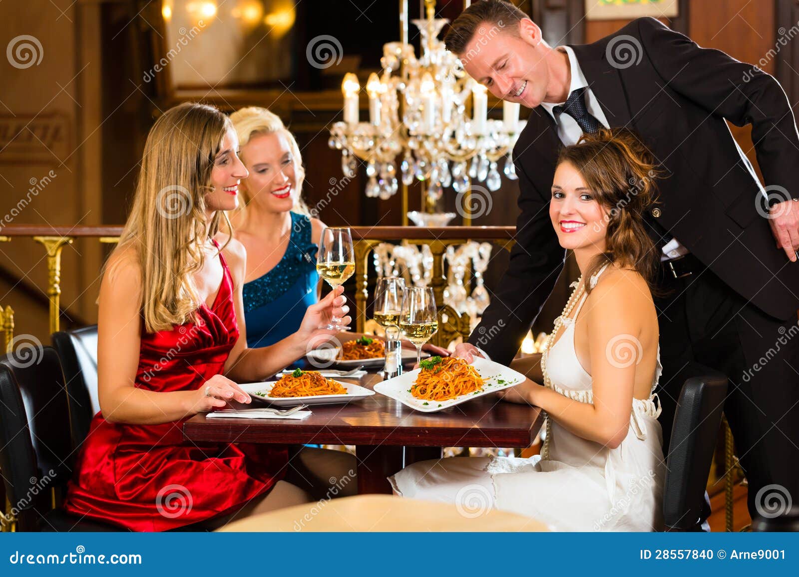 Waiter Served Dinner in a Fine Restaurant Stock Photo - Image of group ...