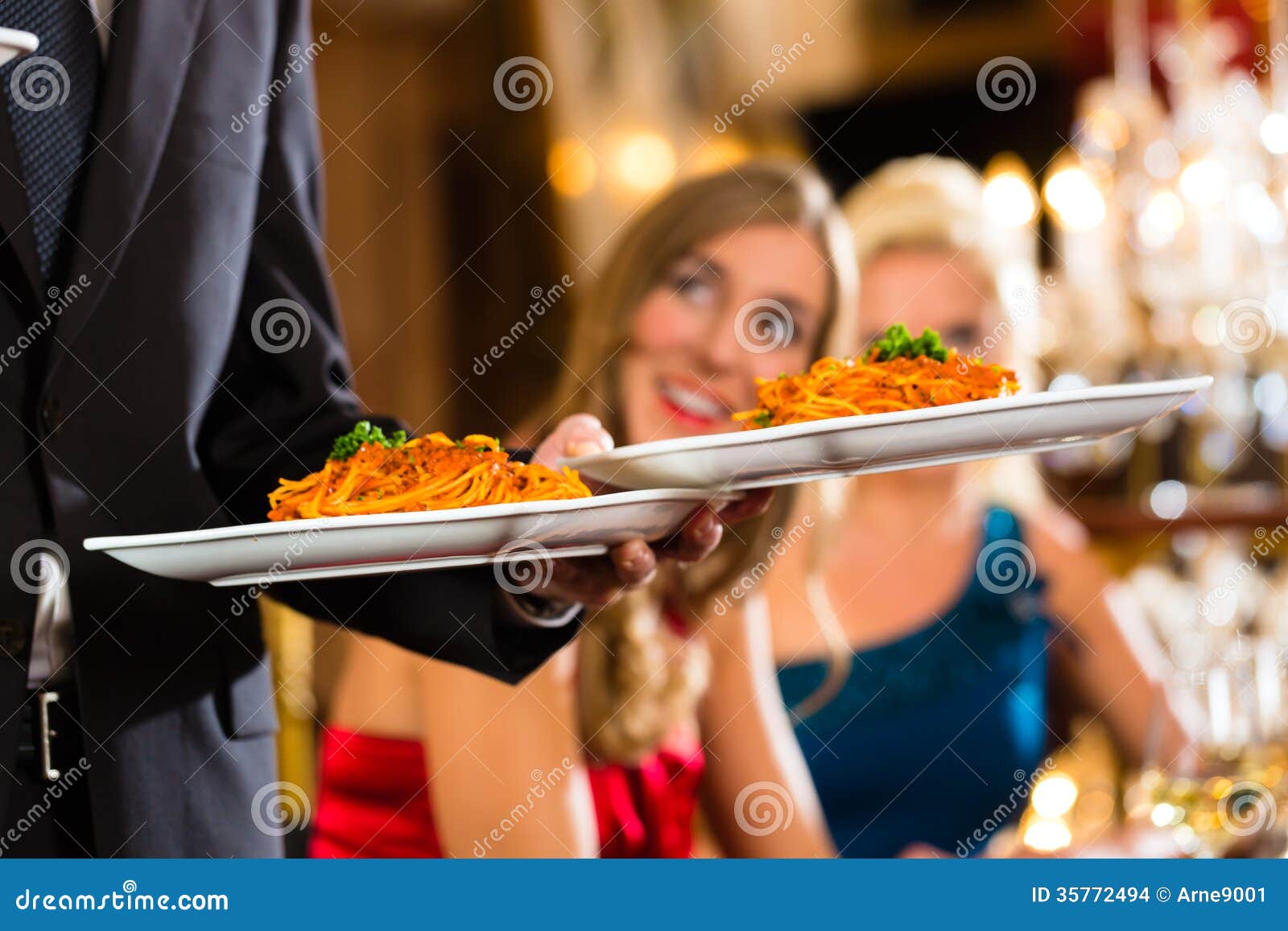 Waiter Served Dinner in a Fine Restaurant Stock Photo - Image of ...