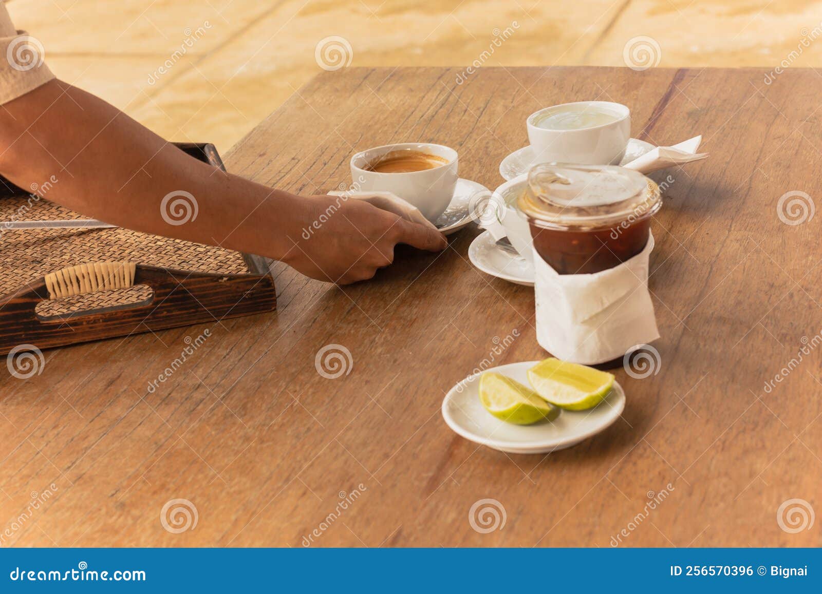 Waiter Serves Coffee at Cafe on Table Outdoors. Stock Photo - Image of ...