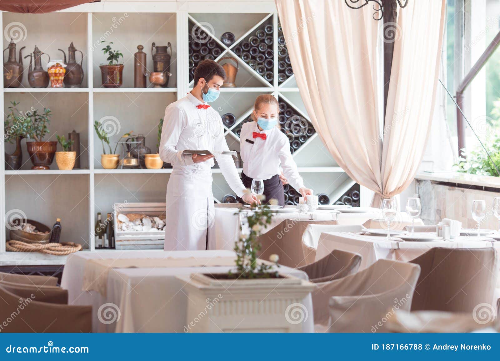 Waiter Serves Delicious Grilled Marinated Steaks And Roasted Vegetables ...