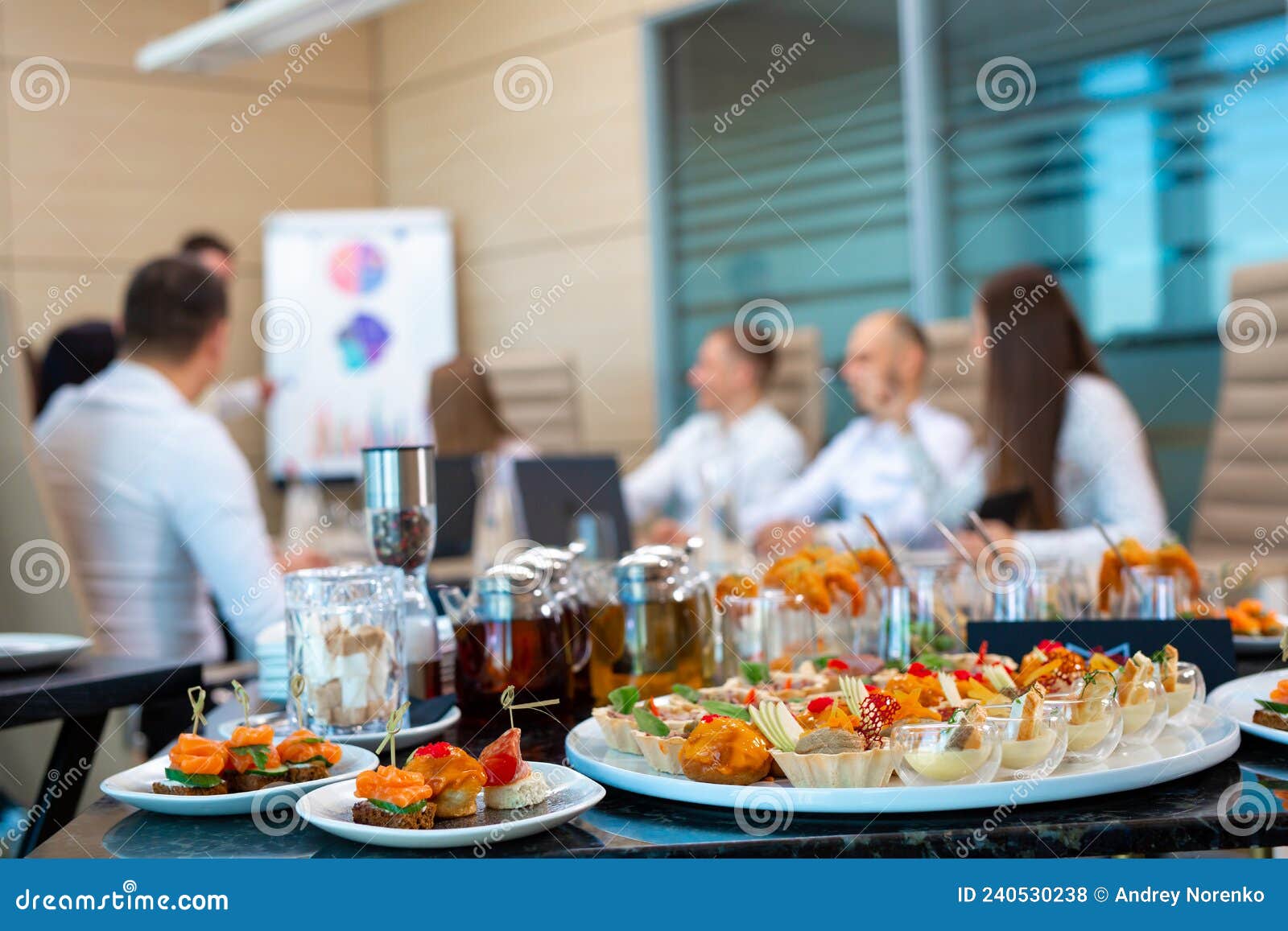 Waiter Serving a Banquet in the Office Stock Photo - Image of cuisine ...