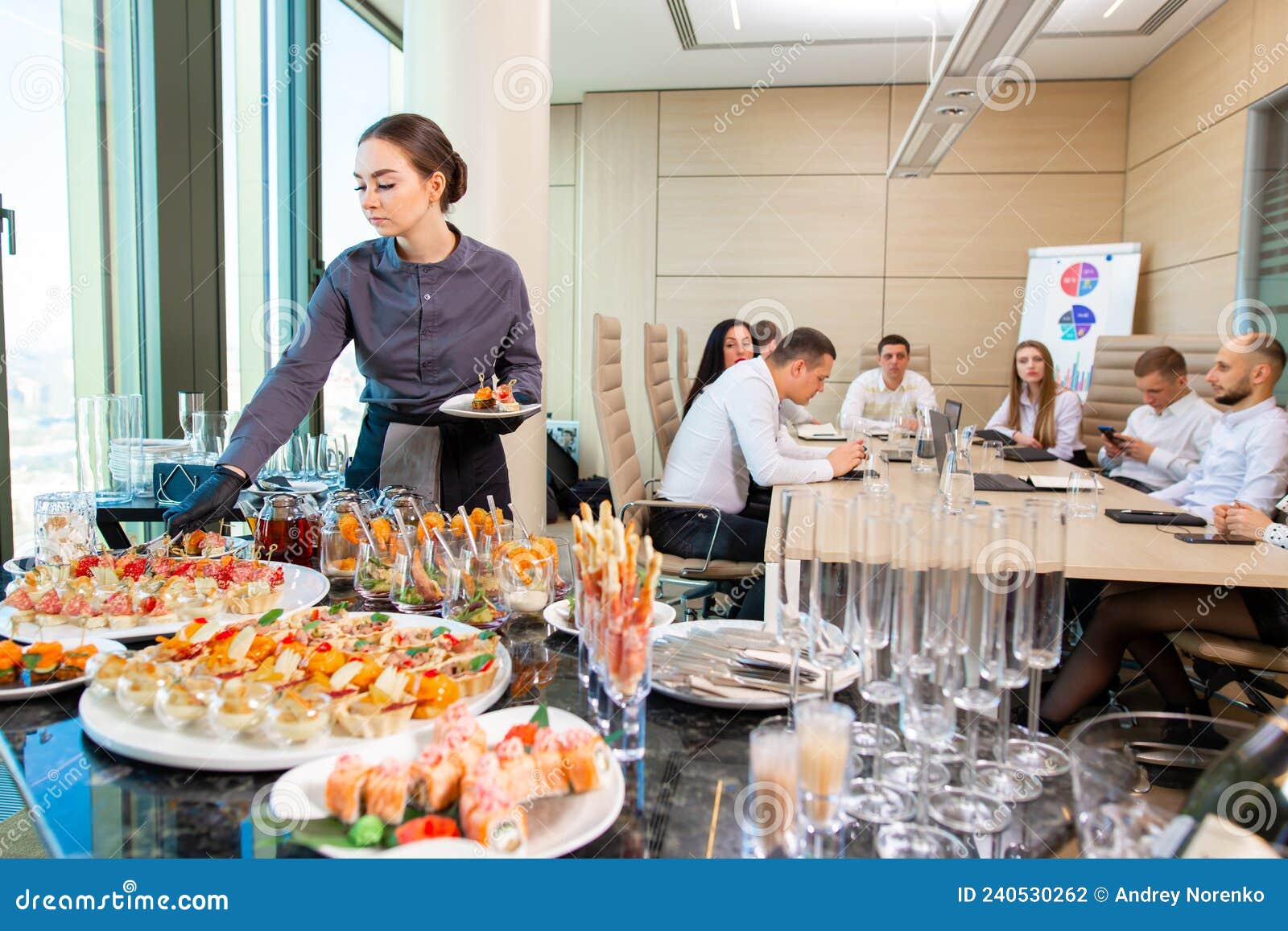 Waiter Serving a Banquet in the Office Stock Photo - Image of cuisine ...