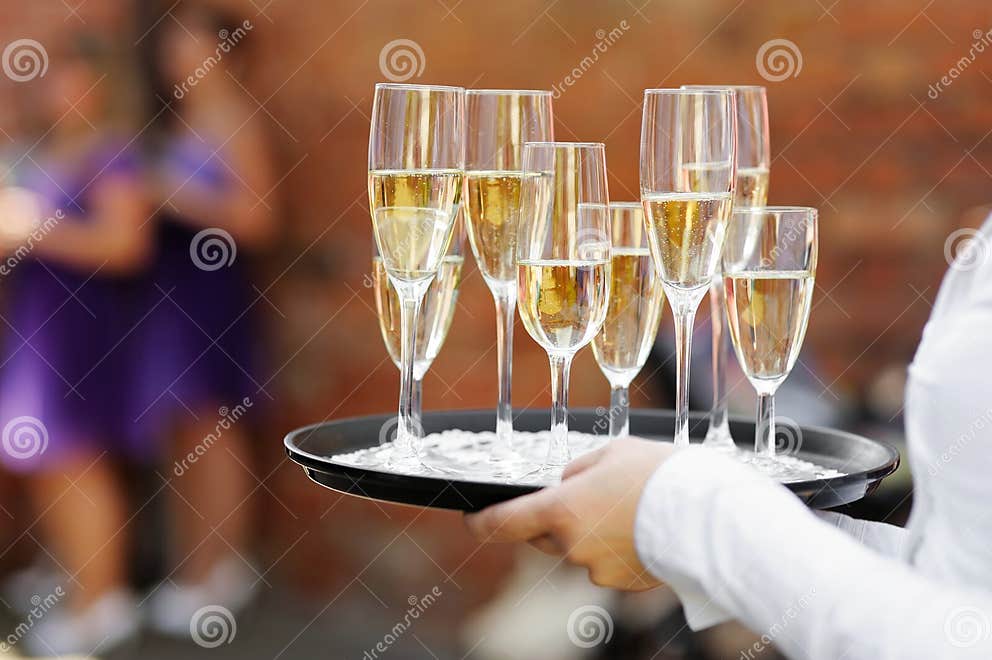 Waiter serving champagne stock photo. Image of flavor - 20914372