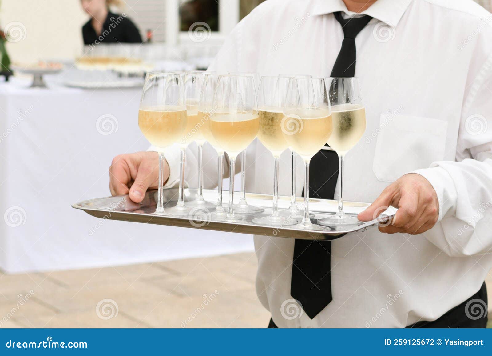 A Waiter Serving Champagne at a Wedding Stock Photo - Image of party ...