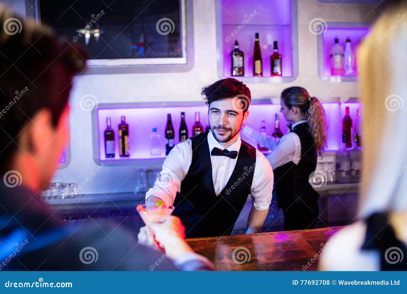 Waiter serving cocktail stock photo. Image of male, beverage - 77692708