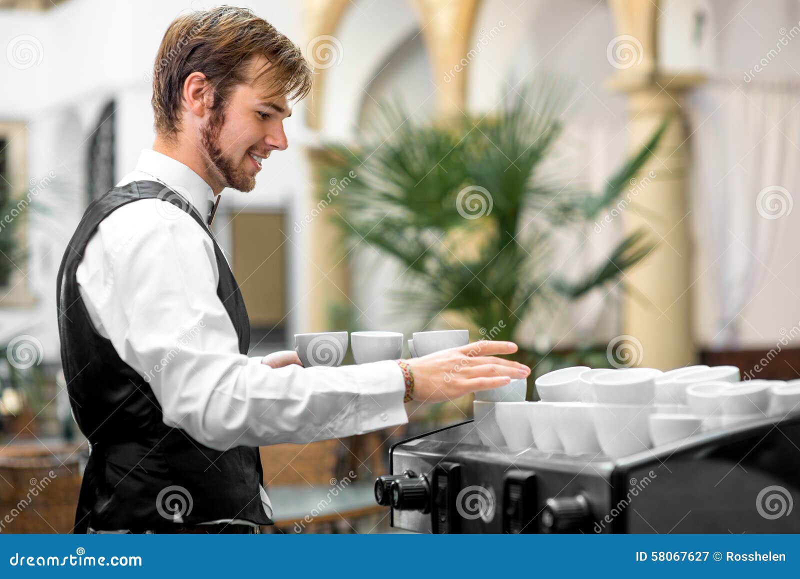 Waiter serving coffee cups stock image. Image of owner - 58067627