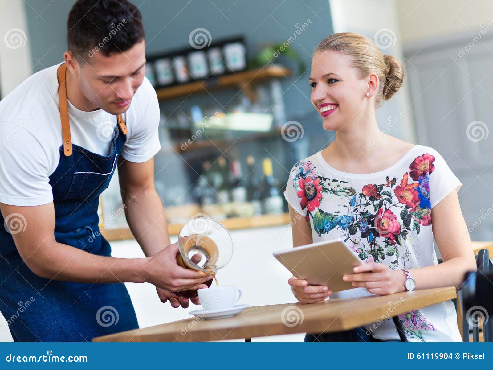 Waiter serving customer stock photo. Image of apron, consumer - 61119904