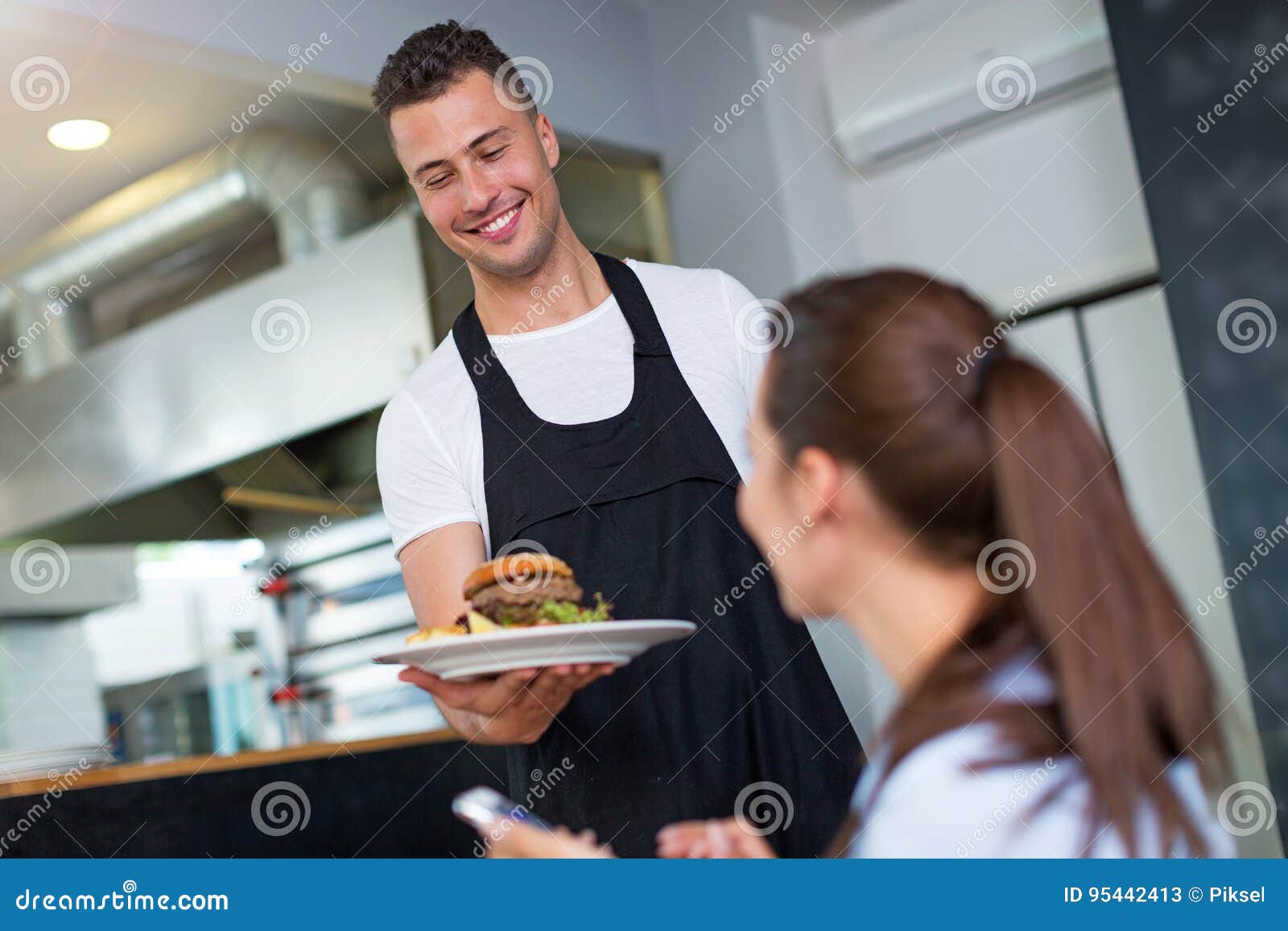 Waiter serving customer stock image. Image of consumer - 95442413
