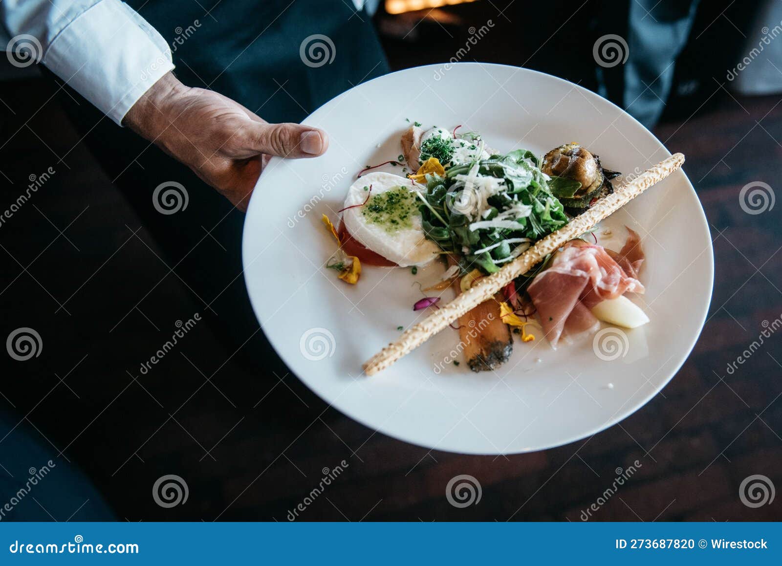 Waiter Serving a Delicious Meal at a Wedding Reception Stock Photo ...