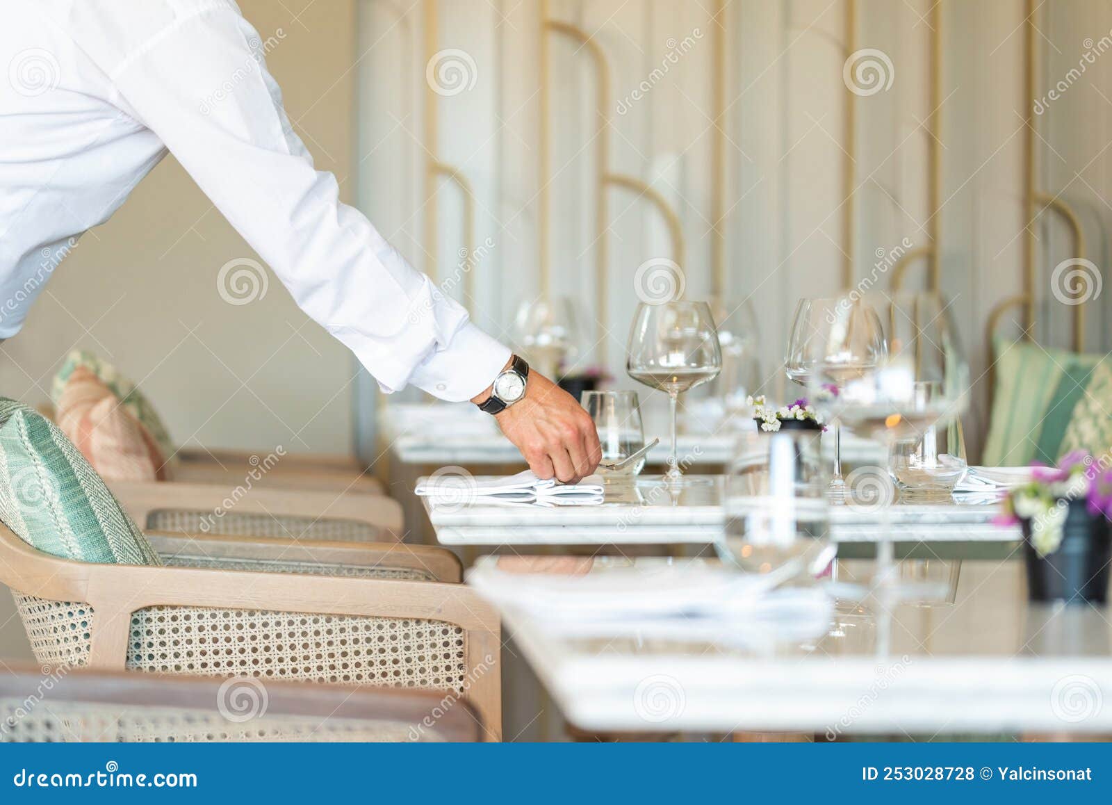 Waiter Serving the Empty Table of the Luxury Restaurant Stock Photo ...