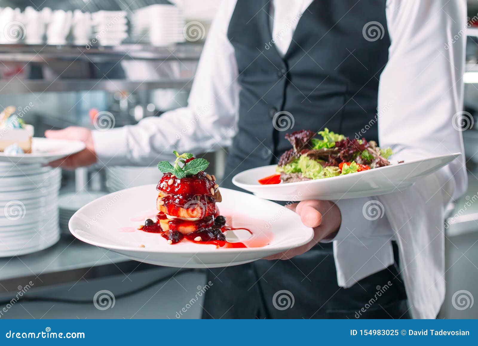 Waiter Serving in Motion on Duty in Restaurant. the Waiter Carries ...