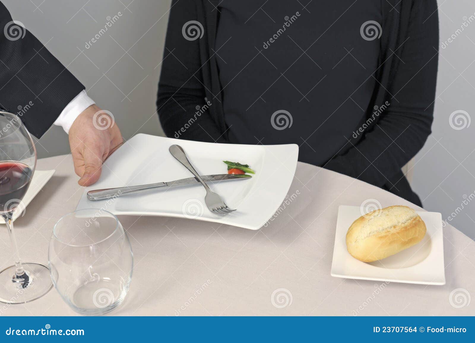 Waiter serving a plate stock photo. Image of table, classical - 23707564