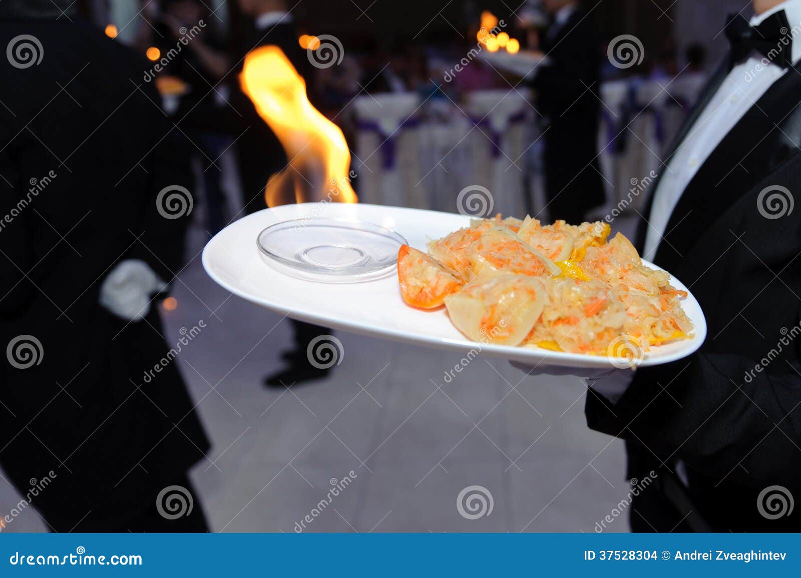 Waiter Serving Plate with Fire Stock Photo - Image of food, dining ...