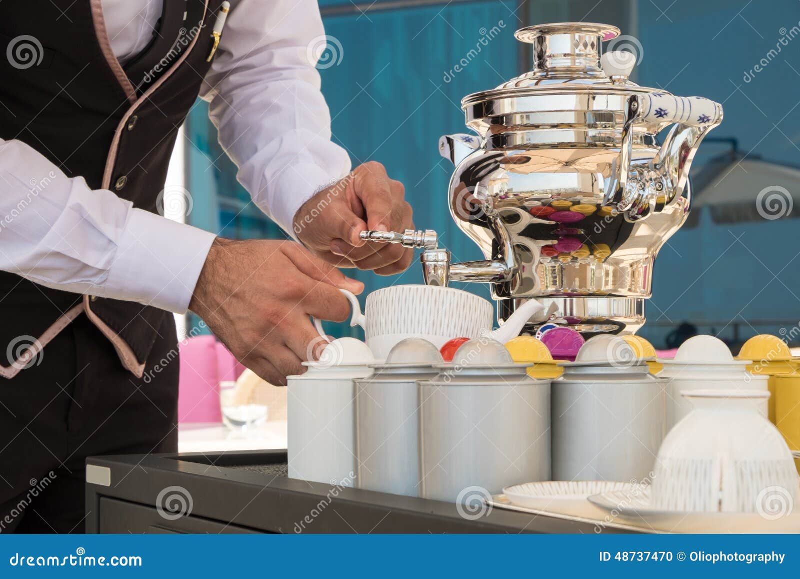 Waiter serving tea stock photo. Image of restaurant, service - 48737470