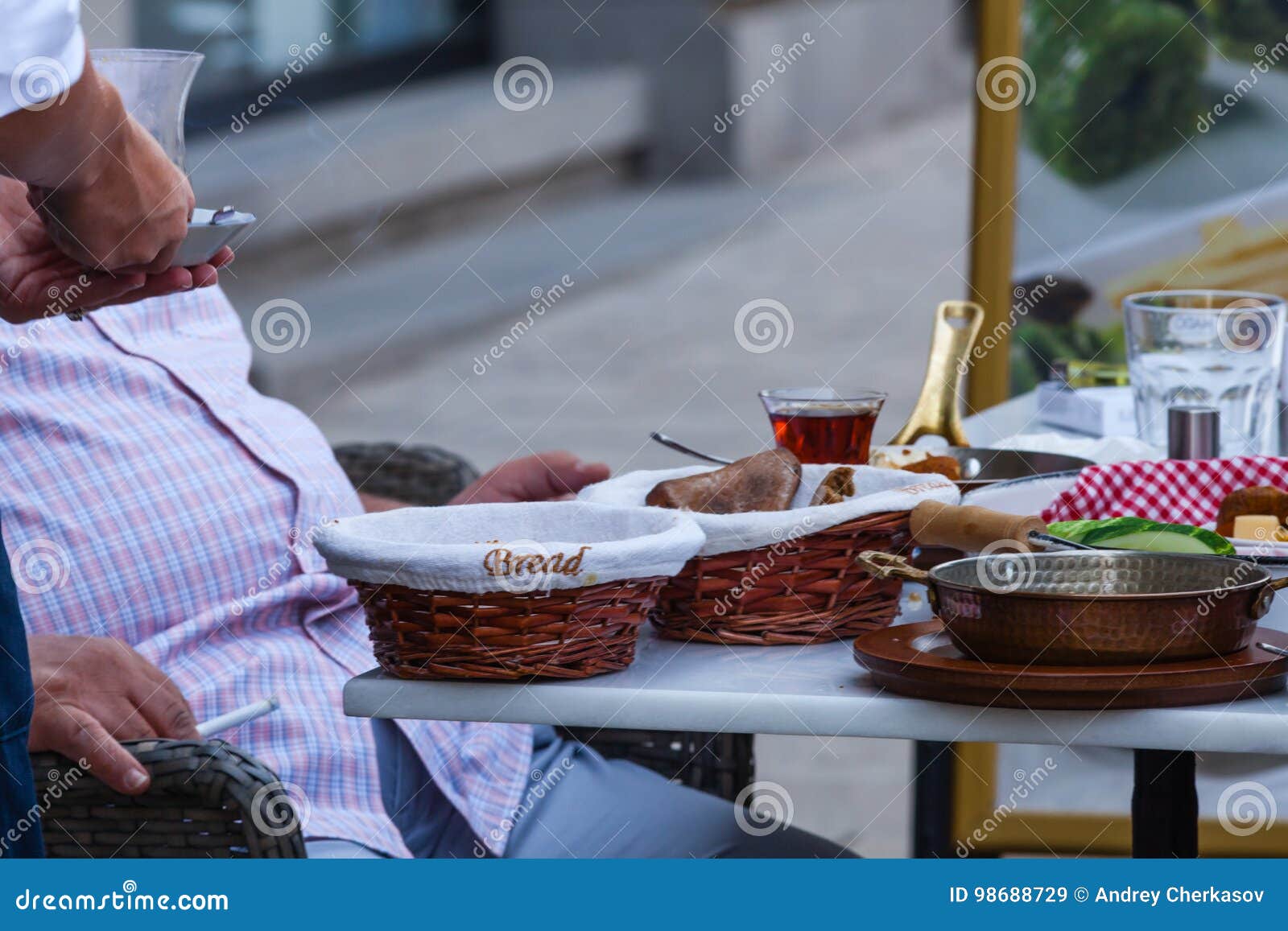 Waiter Serving Tea To Customer in Street Cafe Stock Image - Image of ...