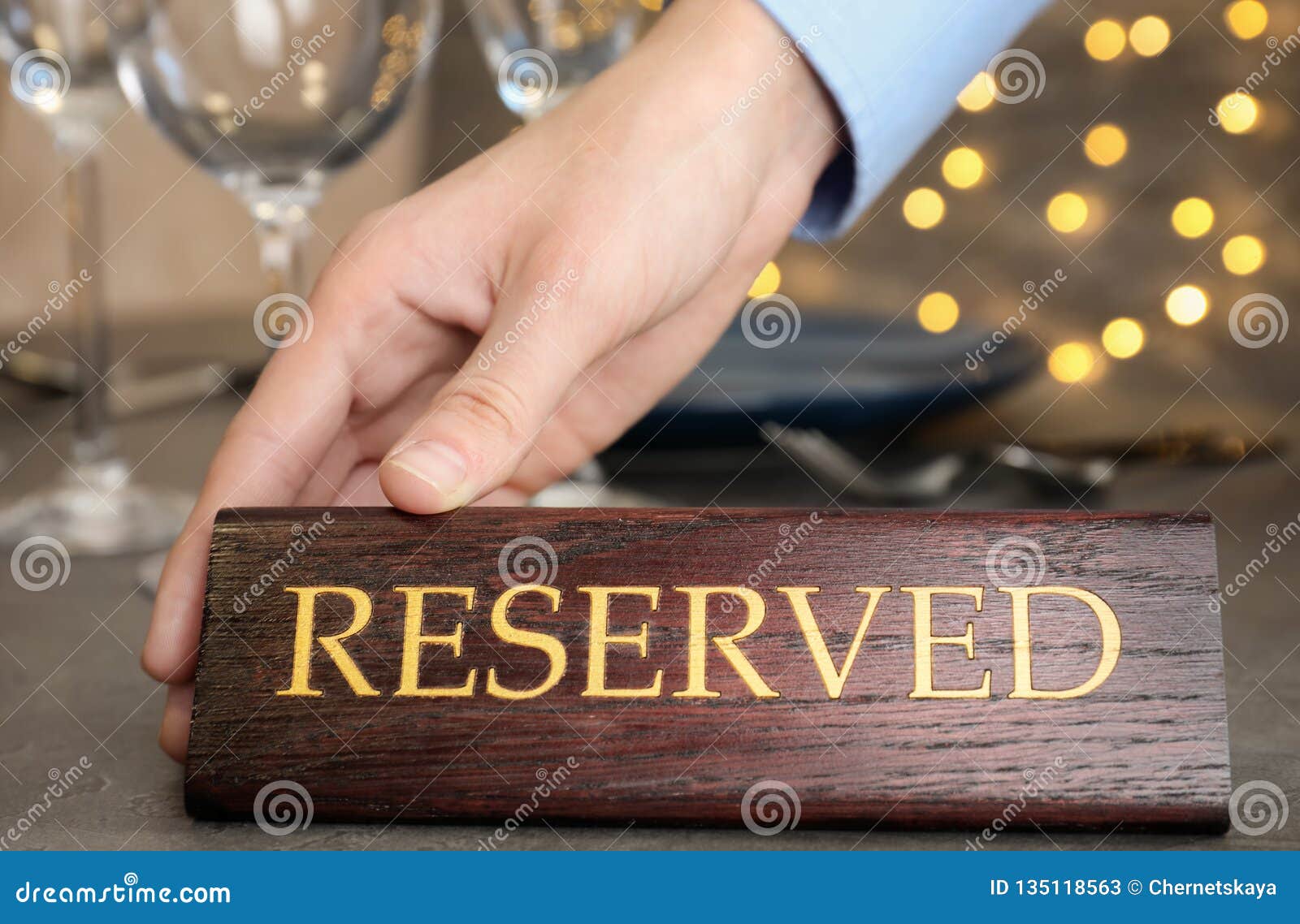 Waiter Setting RESERVED Sign on Restaurant Table Stock Image - Image of ...