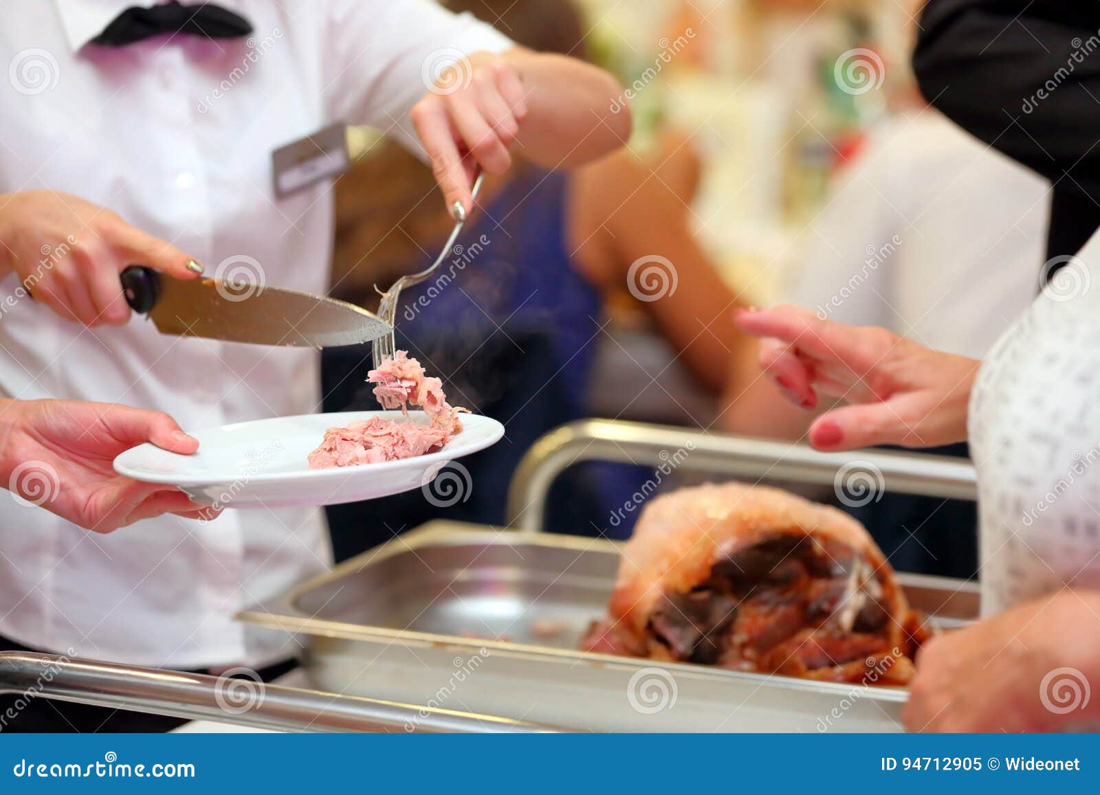 Waiter Sliced and Serves Roasted Meat at the Party Stock Image - Image ...