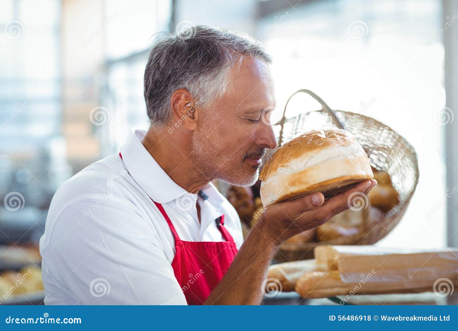 Waiter Smelling Freshly Baked Bread Stock Photo - Image of industry ...