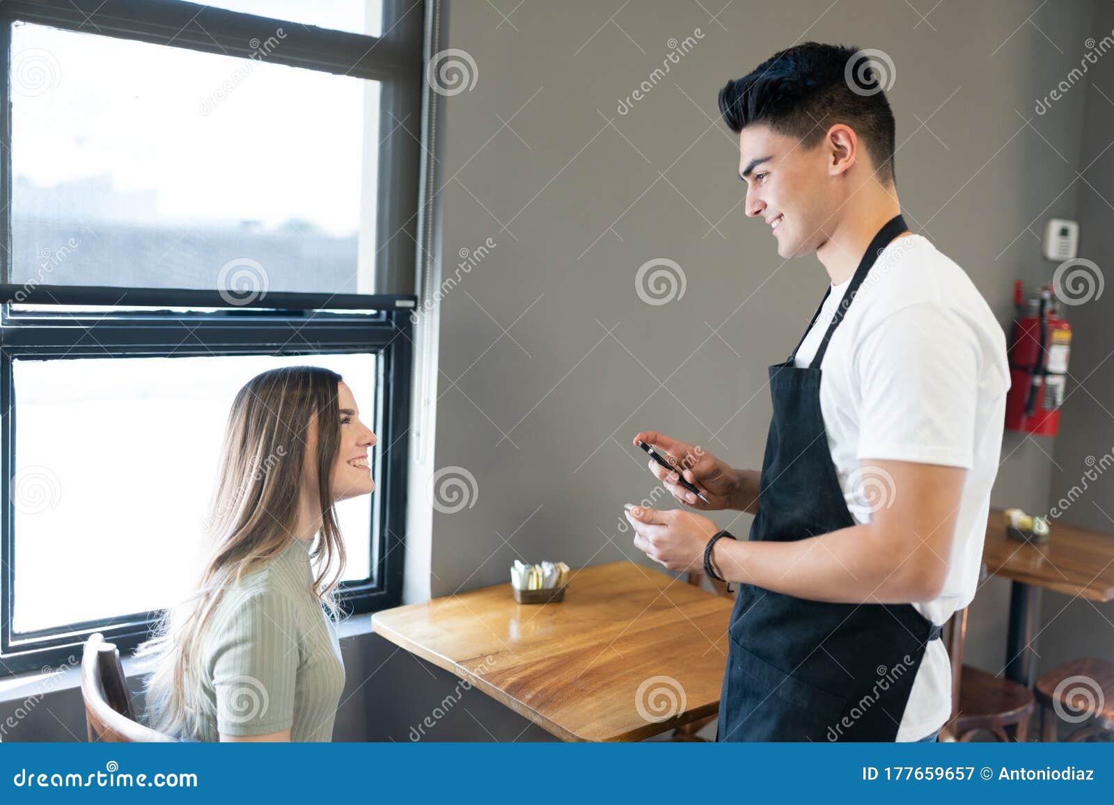 Waiter Taking Order at Coffee Shop Stock Image - Image of apron, shop ...