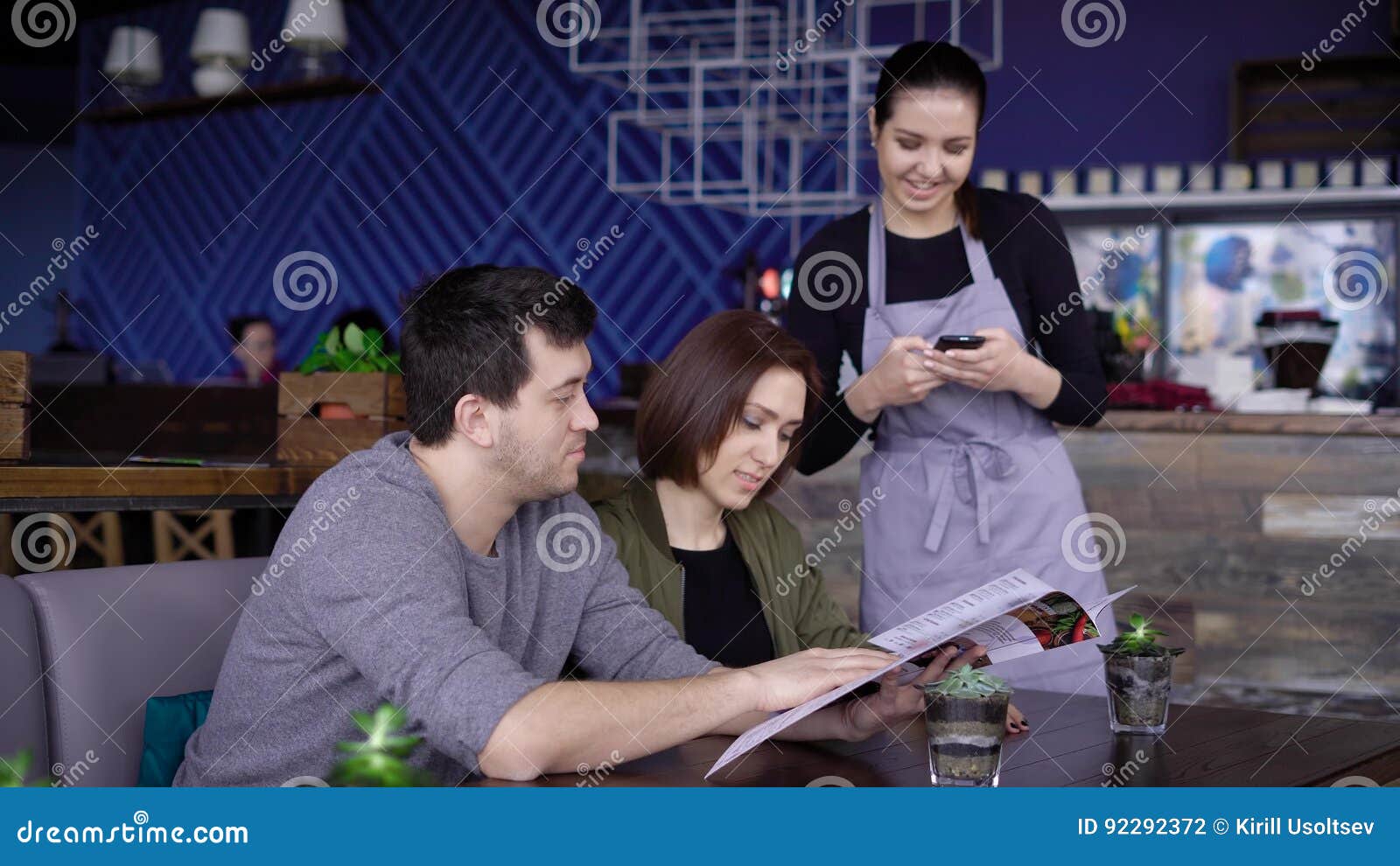 Waiter Taking Order from Two People Sitting at Table Stock Footage ...