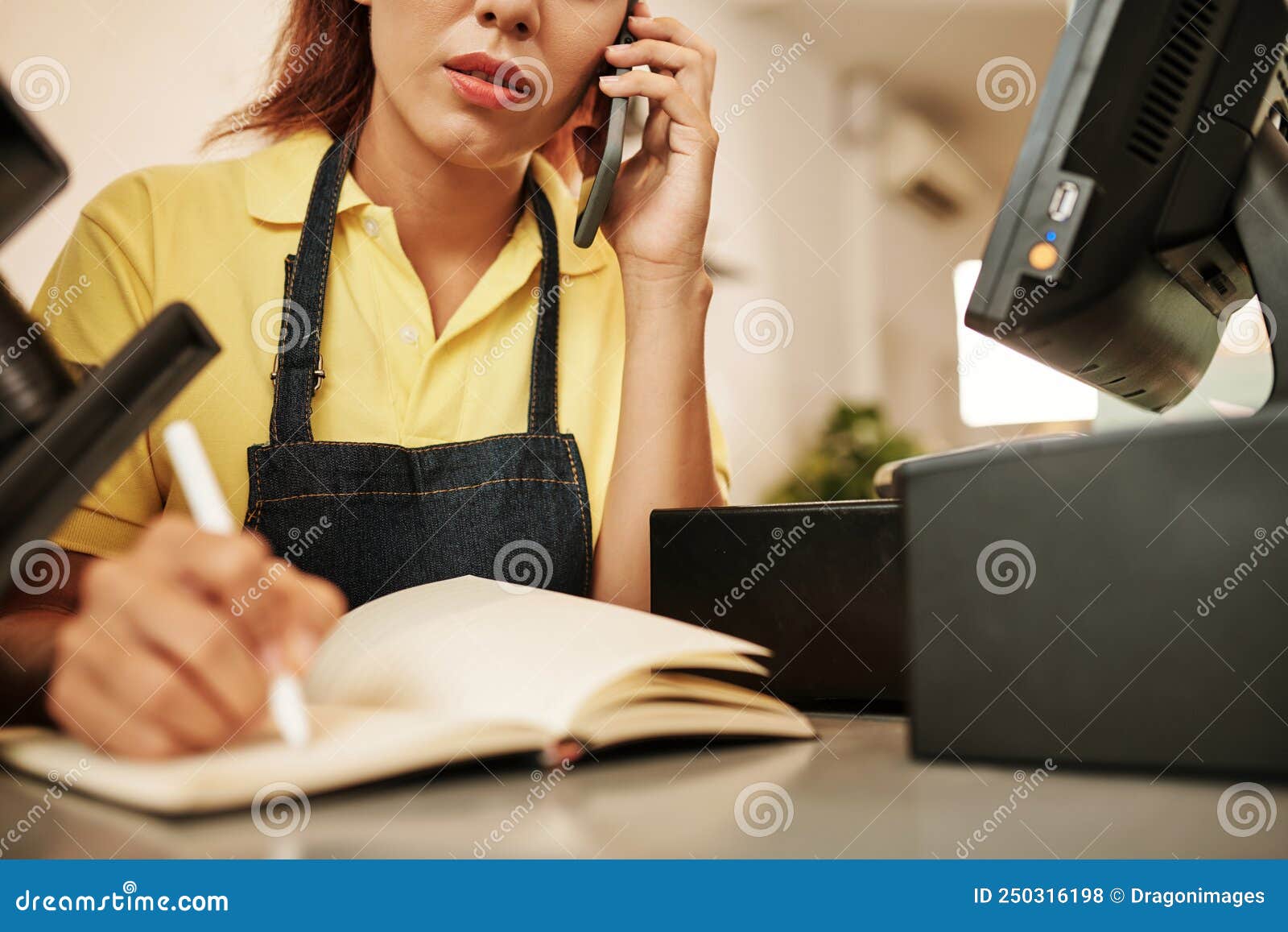 Waiter Talking on Phone with Customer Stock Photo - Image of working ...