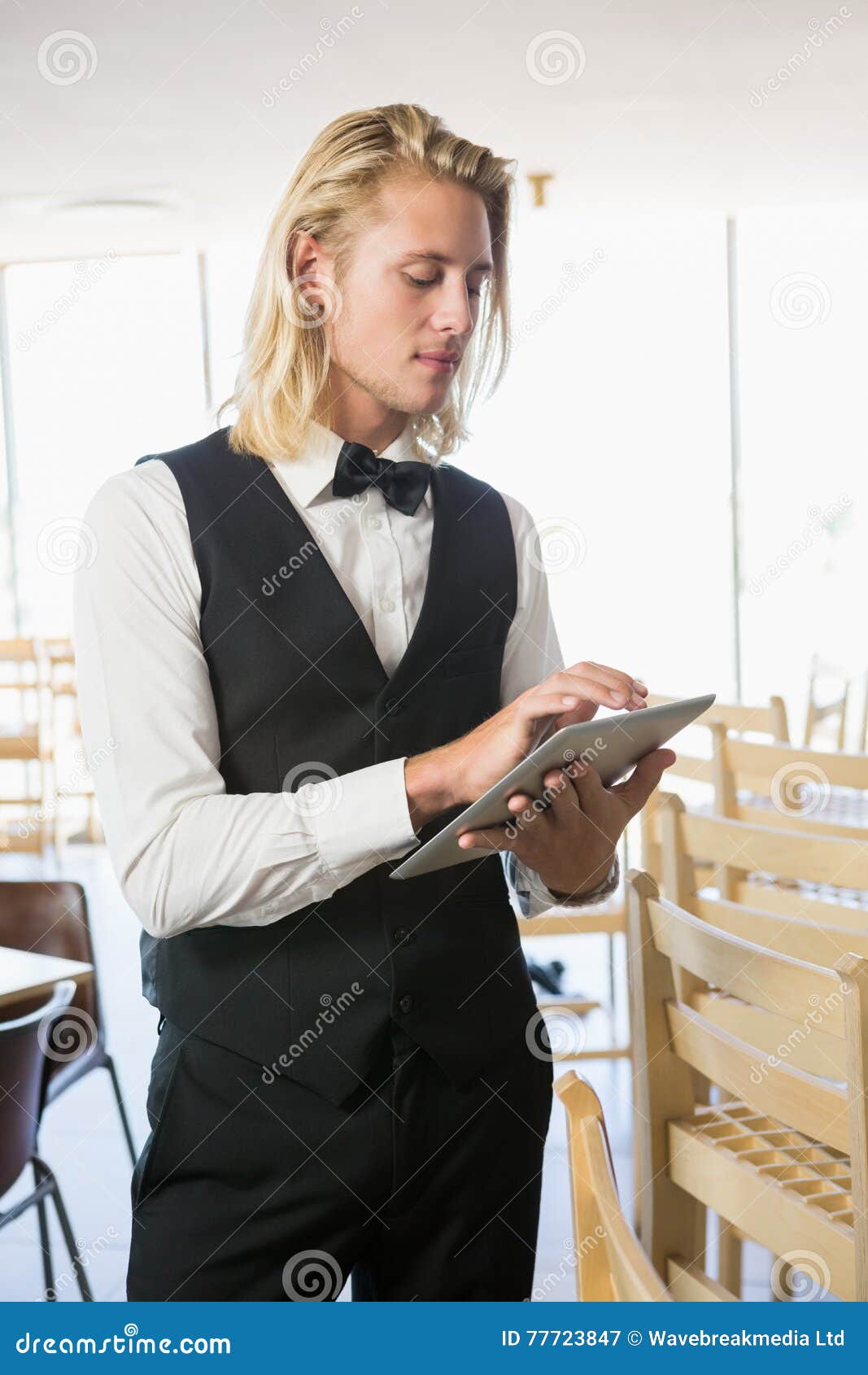 Waiter Using Digital Tablet in Restaurant Stock Image - Image of ...