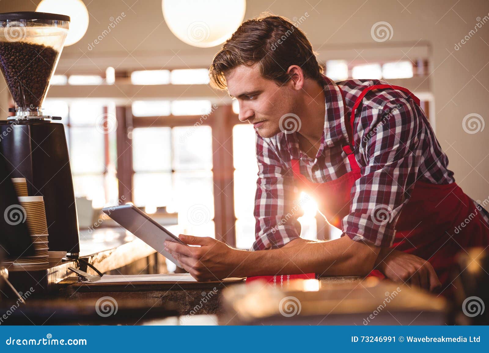 Waiter Using Digital Tablet Stock Image - Image of computer, apron ...
