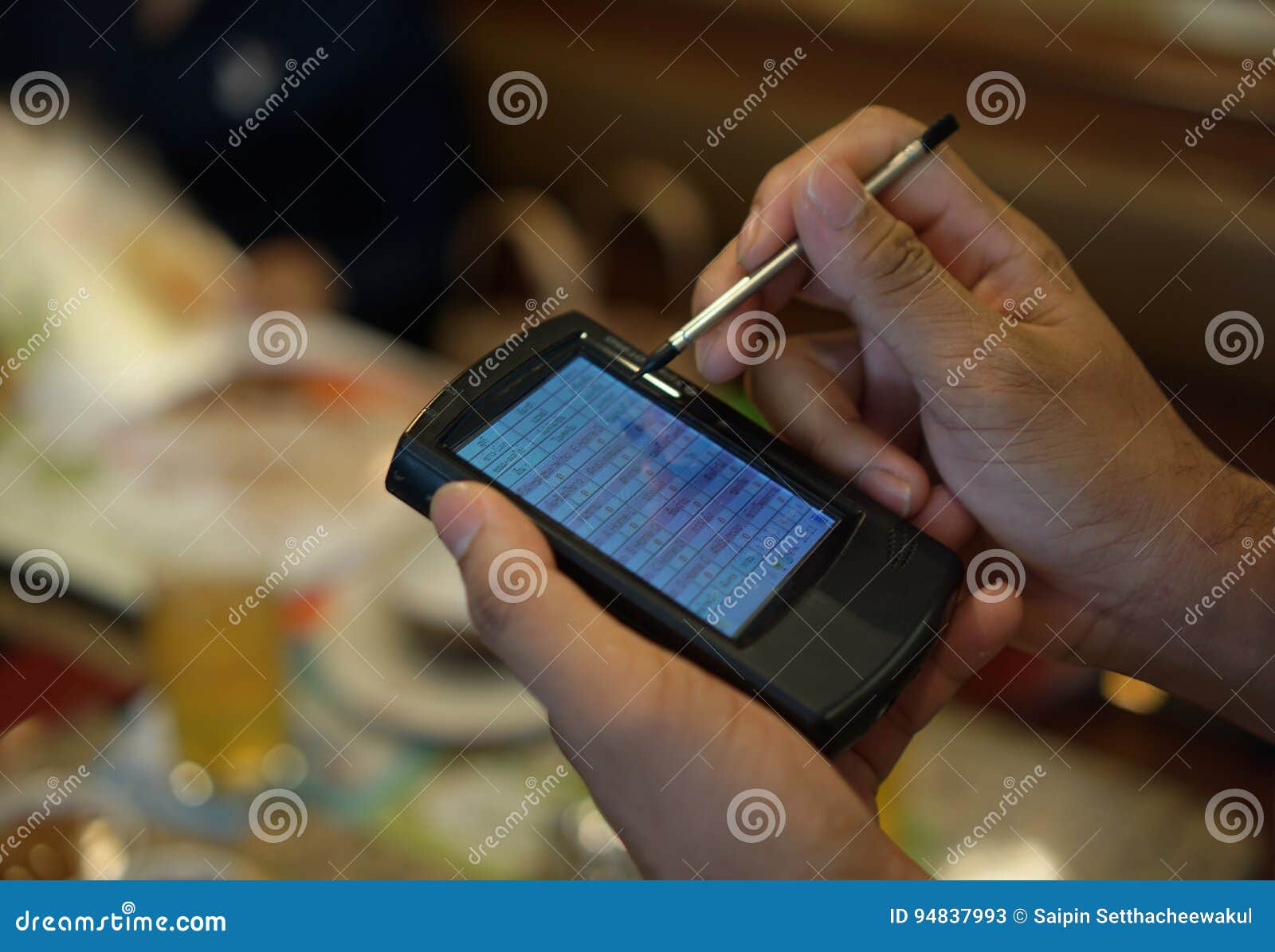 A Waiter Using a PC Pocket, PDA Technology Stock Image - Image of meal ...