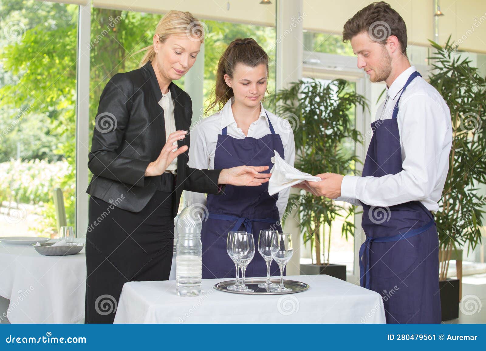 Waiter Or Waitress Serving Burger In American BBQ Restaurant On Wooden ...
