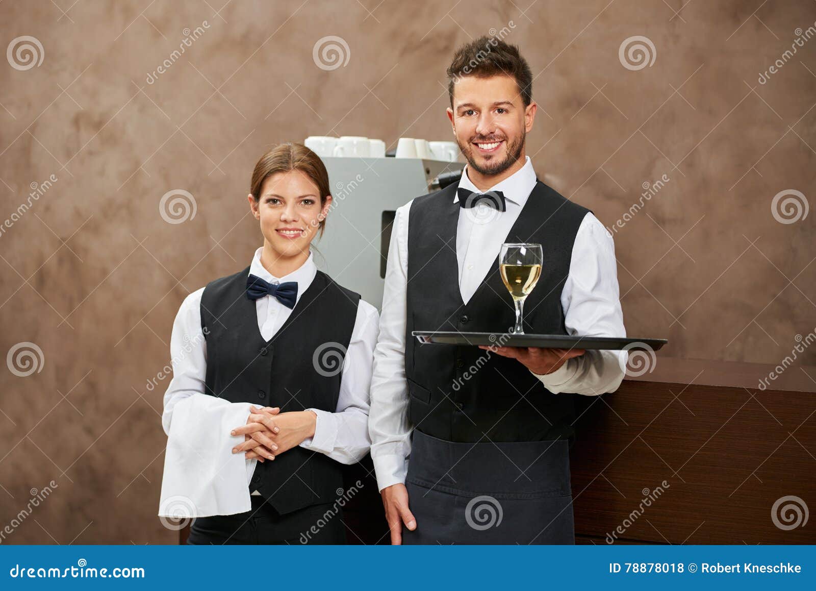 Waiter and Waitress Serving White Wine Stock Photo - Image of waiter ...