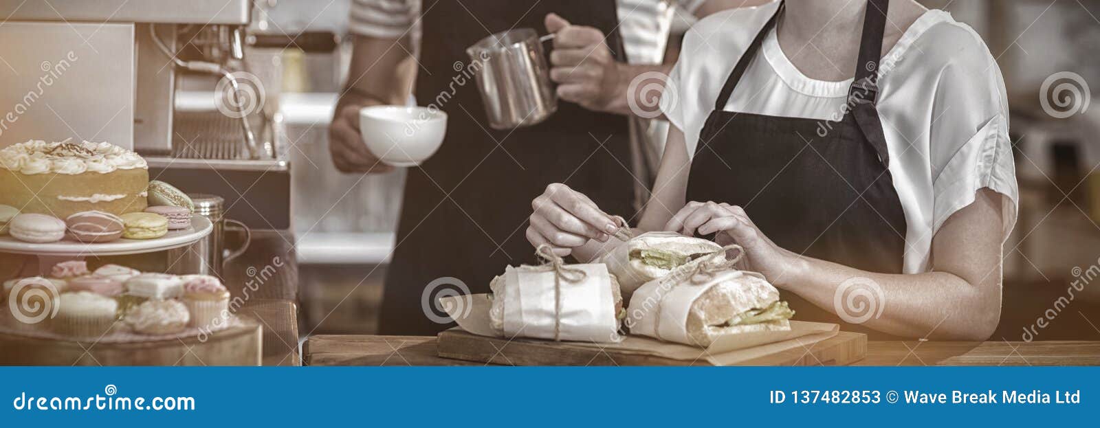 Waiter and Waitress Working Behind the Counter Stock Image - Image of ...