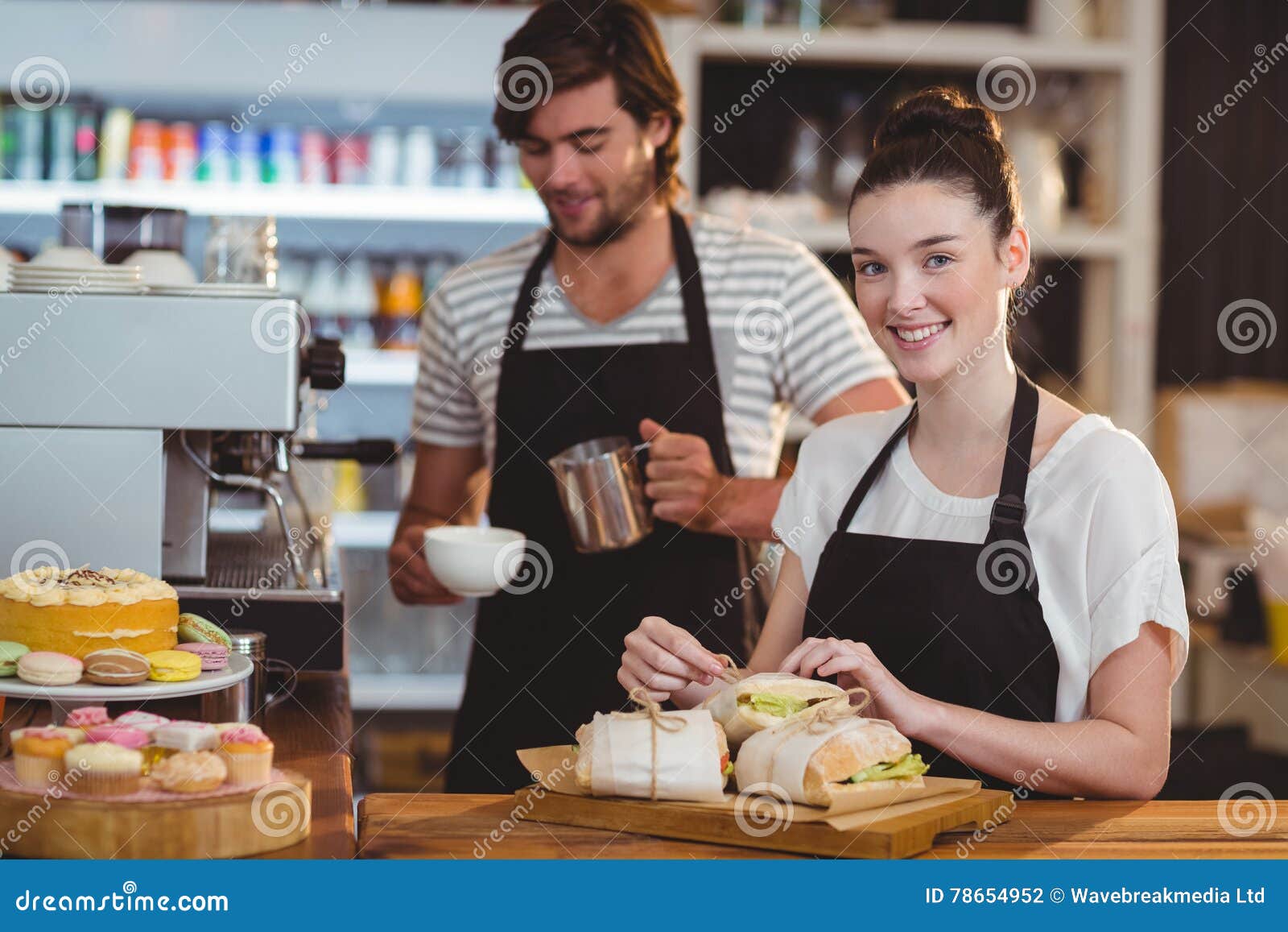 Waiter and Waitress Working Behind the Counter Stock Photo - Image of ...