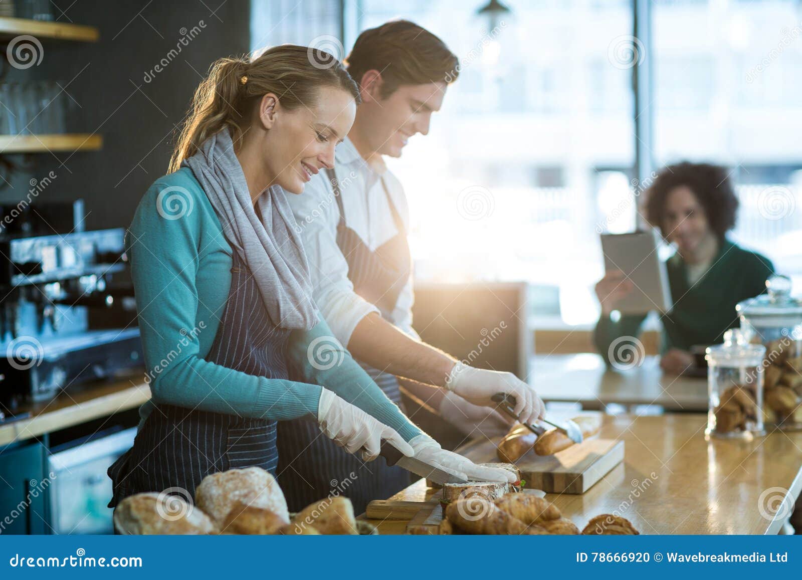 Waiter and Waitress Working at Counter in CafÃ© Stock Photo - Image of ...