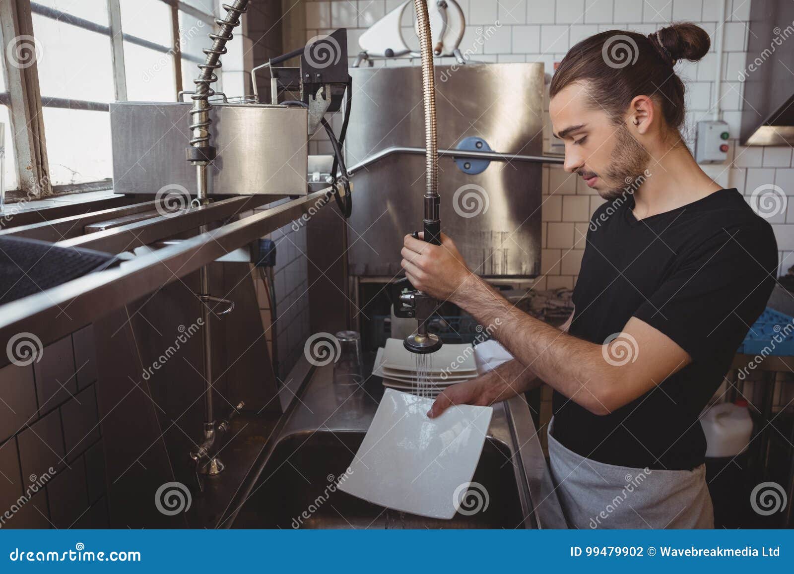 Waiter Washing Plates in Cafe Stock Photo - Image of holding ...