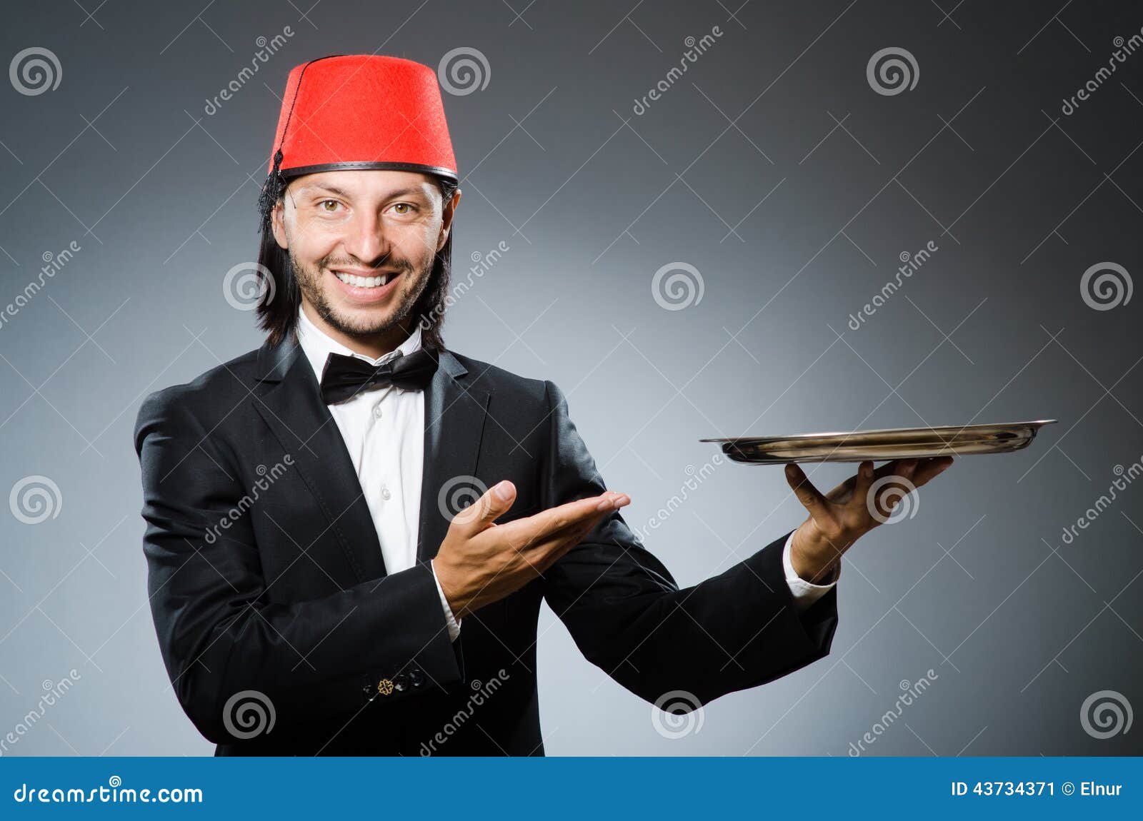Waiter wearing traditional stock image. Image of middle - 43734371