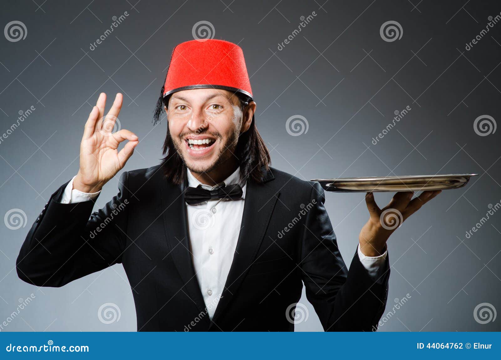 Waiter wearing traditional stock photo. Image of dress - 44064762