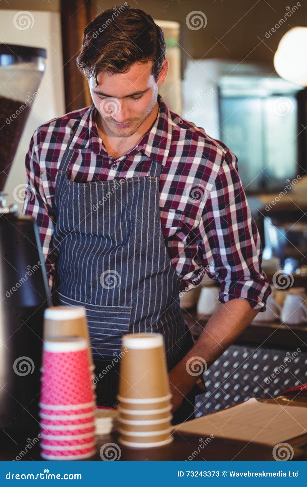 Waiter working at the till stock image. Image of barista - 73243373