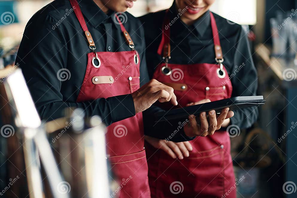 Waiters Checking Menu on Tablet Computer Stock Image - Image of ...